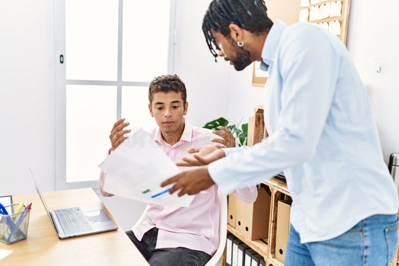Two Men Business Workers Discussing Working at Office Stock Photo ...