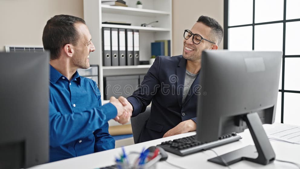 Two Men Business Workers Using Computer Shake Hands at Office Stock ...