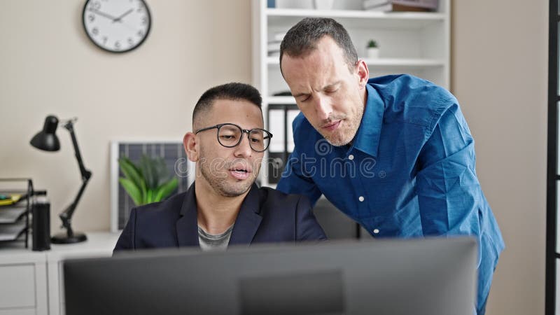 Two Men Business Workers Using Computer and Speaking at Office Stock ...
