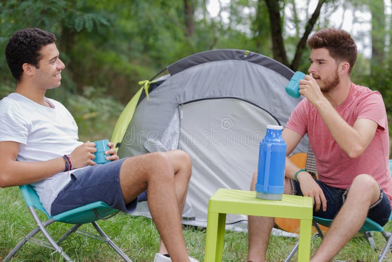 Two men camping stock image. Image of mountaineering - 258550285