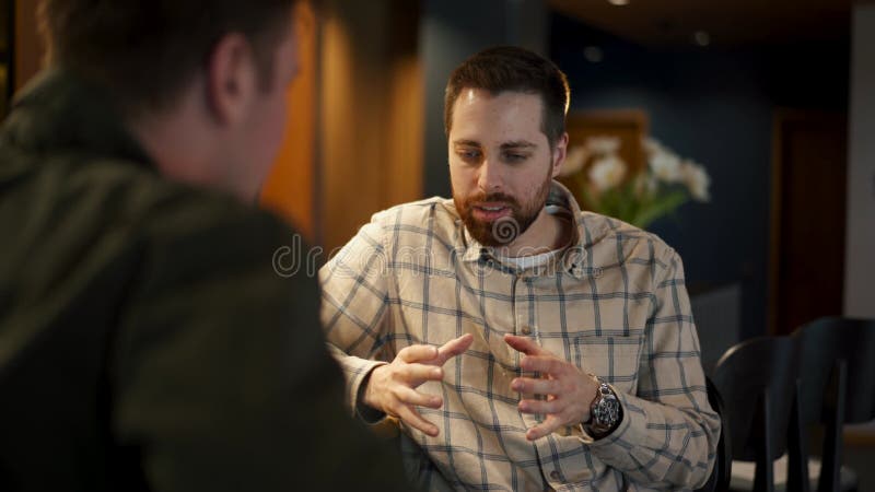 Two Men Chatting in a Bar, Sitting at the Bar Counter Stock Footage ...