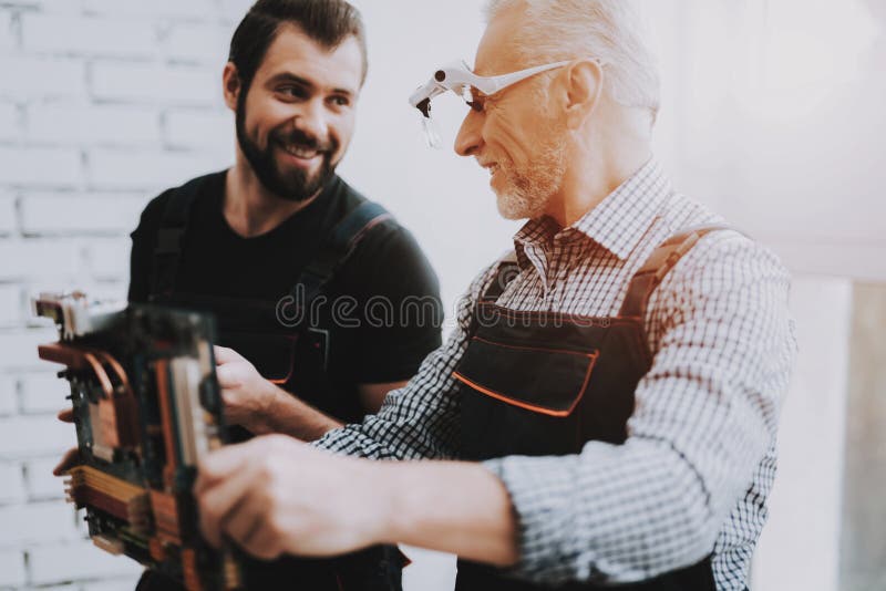 Two Men Checking Hardware Equipment from PC. Stock Photo - Image of ...