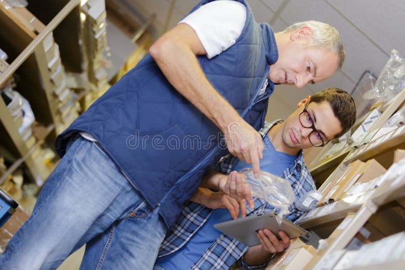 Man Checking Supply Stock in Warehouse Stock Image - Image of casual ...