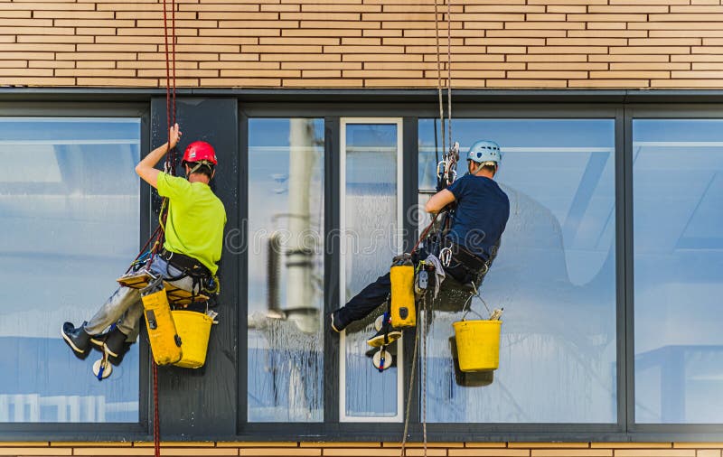 Two Men Cleaning Windows on an Office Building Editorial Photo - Image ...