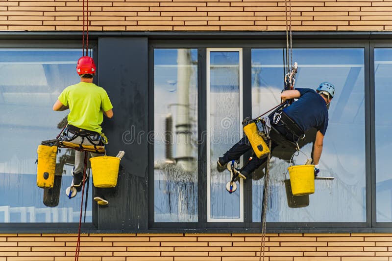 Two Men Cleaning Windows on an Office Building Editorial Photo - Image ...