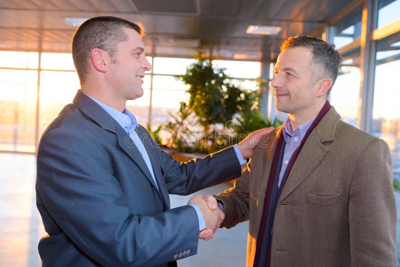 Two Men Congratulating Each Other Stock Photo - Image of pact ...