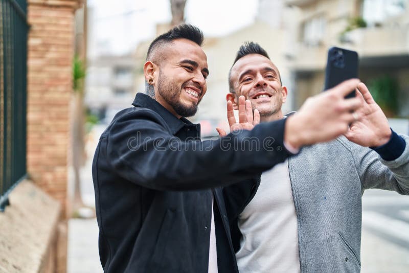 Two Men Couple Smiling Confident Having Video Call at Street Stock ...