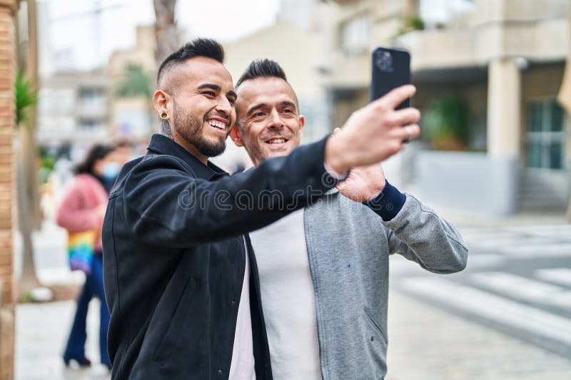 Two Men Couple Smiling Confident Having Video Call at Street Stock ...