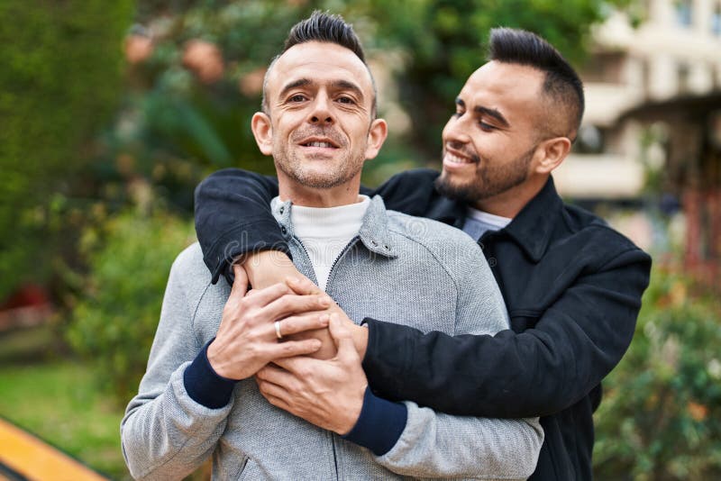 Two Men Couple Smiling Confident Hugging Each Other at Park Stock Image ...