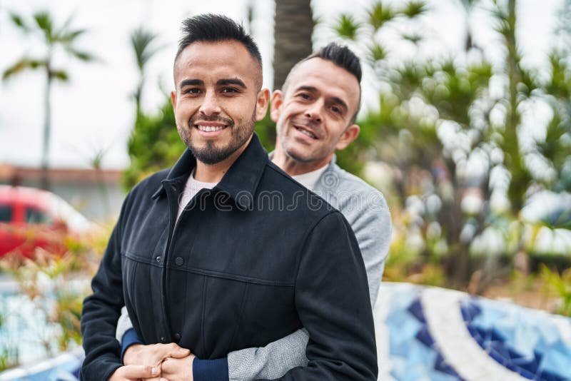 Two Men Couple Smiling Confident Hugging Each Other at Park Stock Photo ...