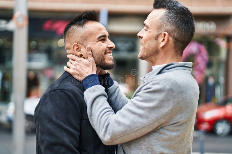 Two Men Couple Smiling Confident Hugging Each Other at Street Stock ...