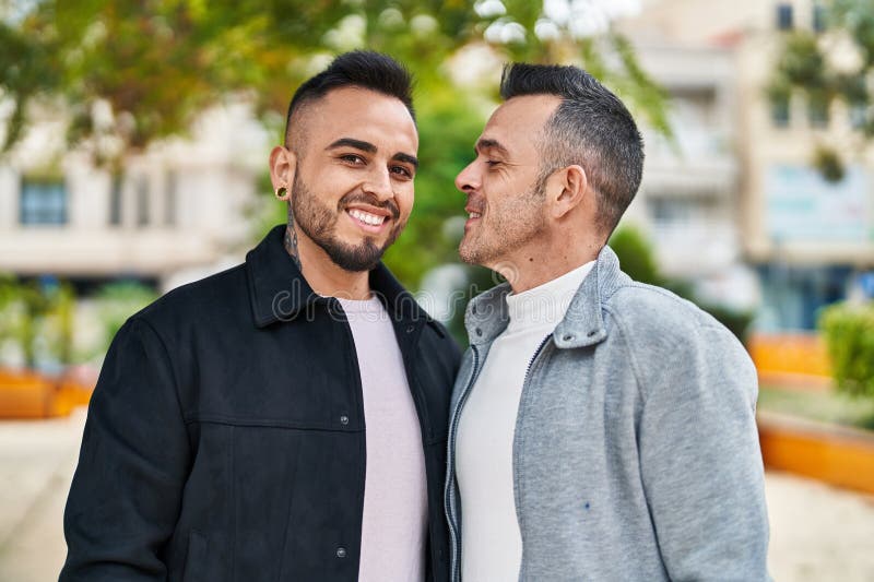 Two Men Couple Smiling Confident Standing Together at Park Stock Photo ...