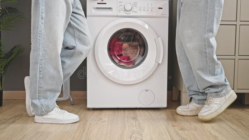 Two Men Couple Waiting for Washing Machine Standing at Laundry Room ...