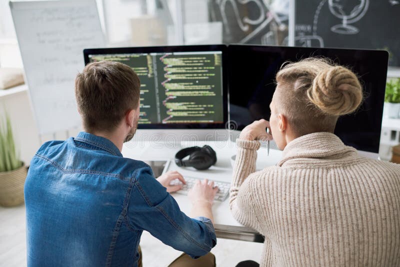Two Men Creating Programs stock image. Image of typing - 116658725