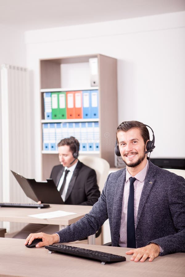Two Men from Customer Service Support Working in the Office Stock Image ...