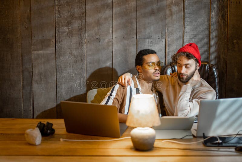 Gay Couple Working on Computers at Home Office Stock Photo - Image of ...