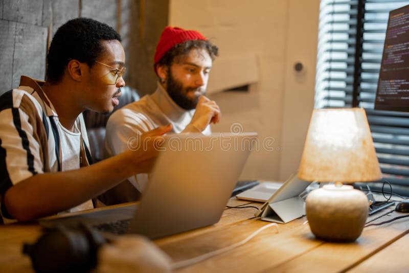 Two Men Working on Computer at Home Office Stock Photo - Image of ...