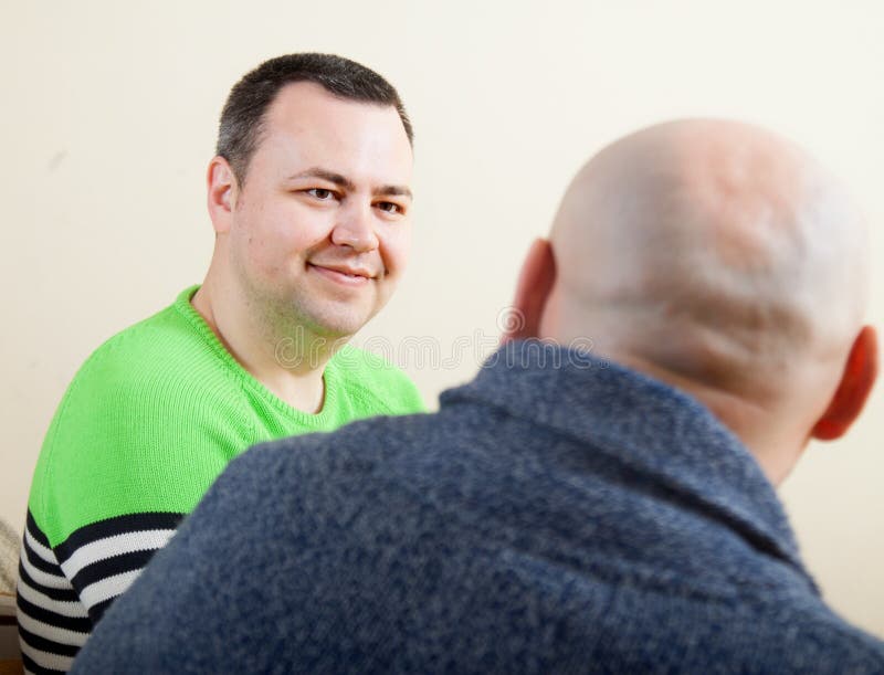 Two men discussing stock photo. Image of mature, caucasian - 41147794