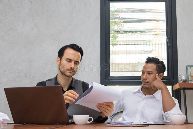 Two Men are Discussing a Job Stock Photo - Image of drinking, smiling ...