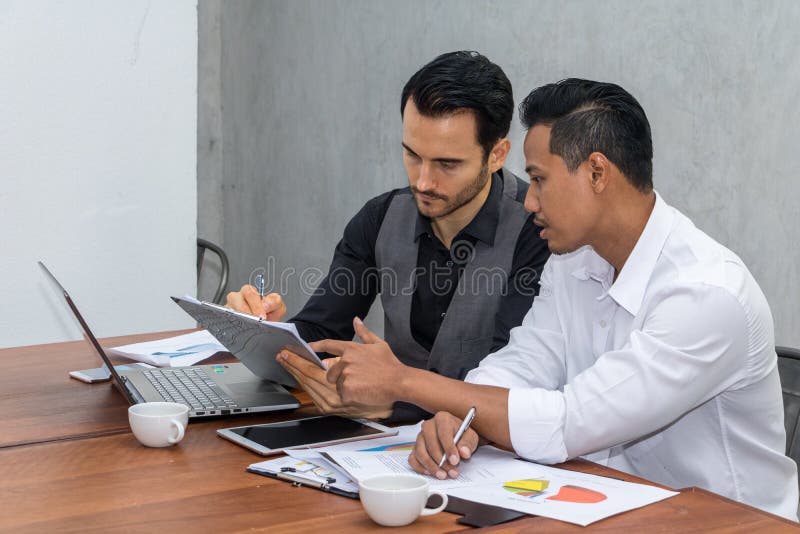 Two Men are Discussing a Job Stock Image - Image of sitting, serious ...