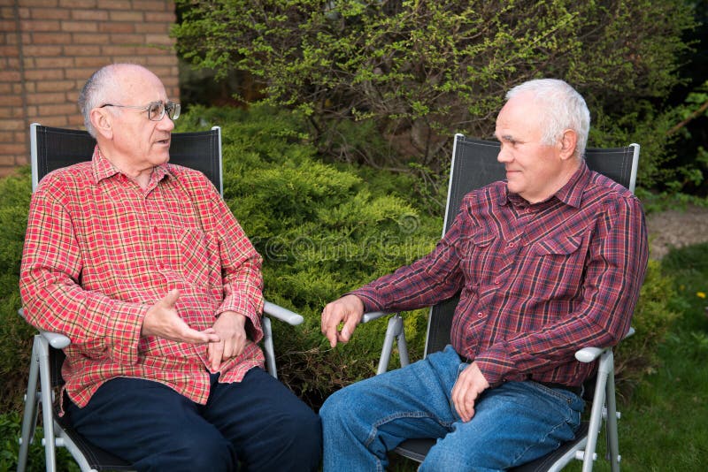 Two men discussing stock image. Image of conversation - 50035199