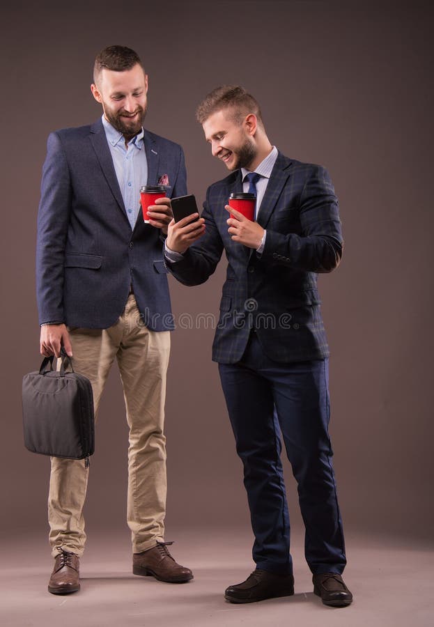 Two Men Drinking Coffee and Talking Stock Photo - Image of business ...