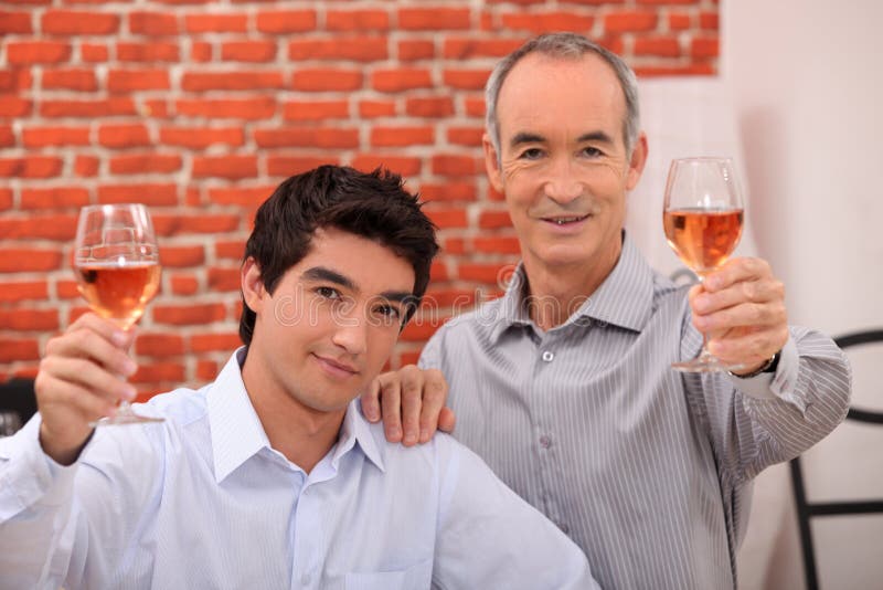 Senior Jewish Man, Adult Son Celebrating Hanukkah Stock Photo - Image ...