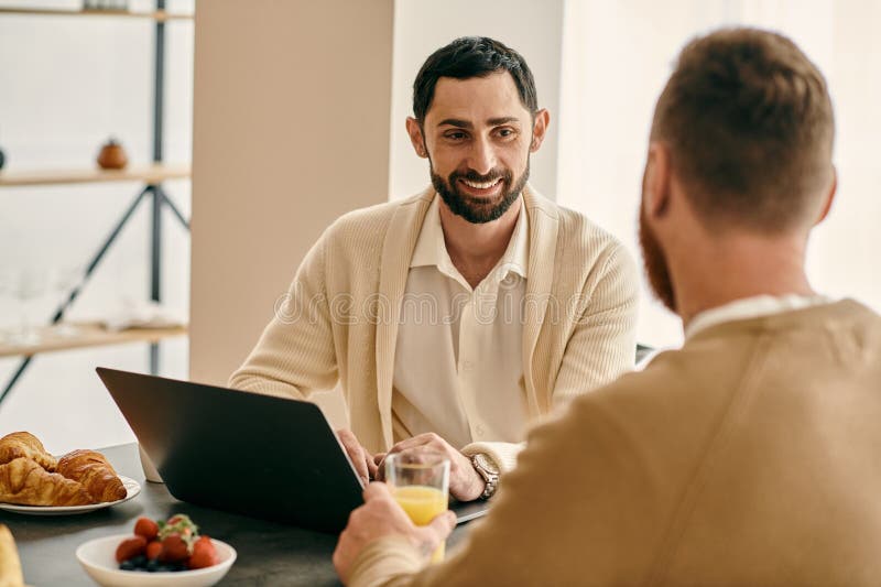 Two Men Engaged in Deep Conversation Stock Photo - Image of ...