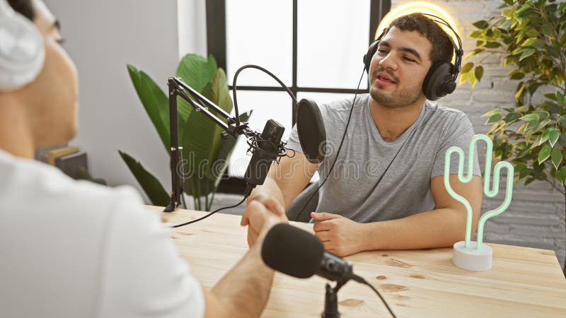 Two Men Engaging in a Podcast Conversation in a Bright, Modern Studio ...