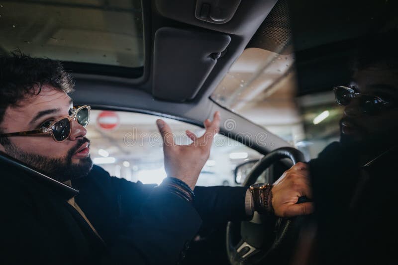 Two Men Engaging in a Serious Conversation Inside a Car Stock Photo ...