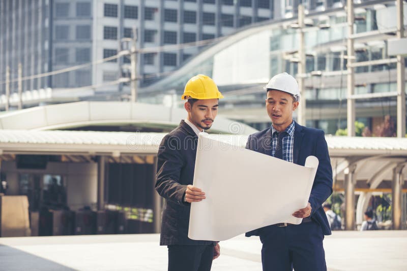 Two Men Engineer Look at Blueprint Architecture Building Contractor ...