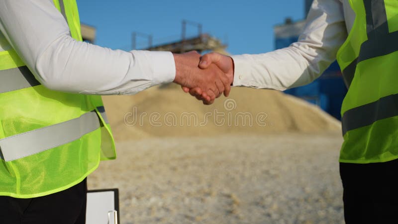 Two Men Engineers Shaking Hands at Quarry Stock Video - Video of gold ...