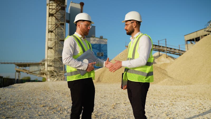 Two Men Engineers are Talking and Shaking Hands at Quarry Stock Video ...