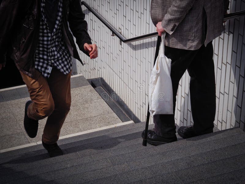 Two men, fast and slow stock photo. Image of stairs, moving - 40324344