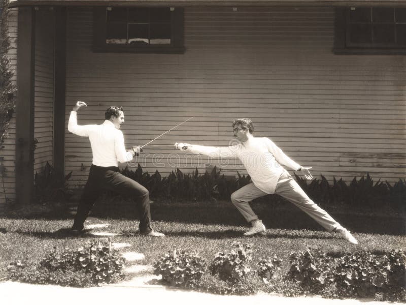 Two men fencing stock photo. Image of retro, front, adult - 77560572