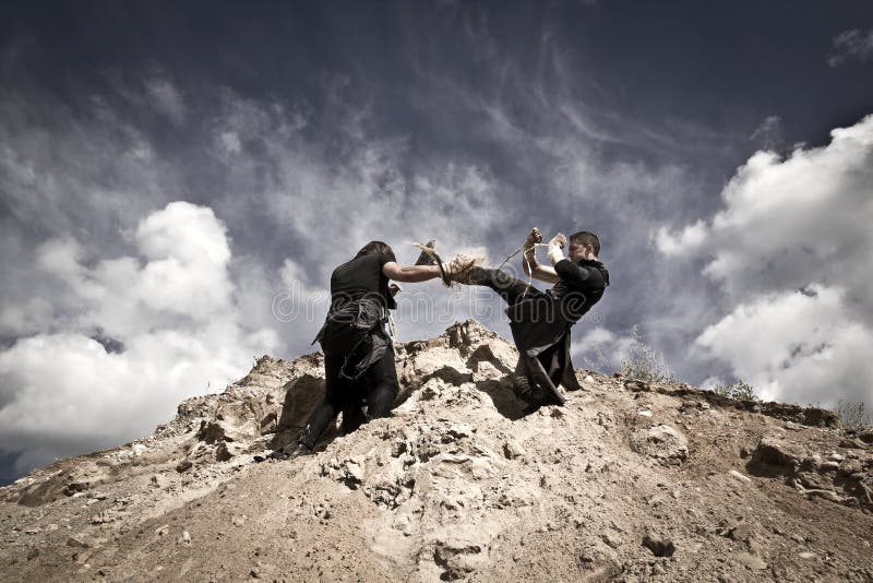 Two men are fighting stock image. Image of blue, jump - 81343923