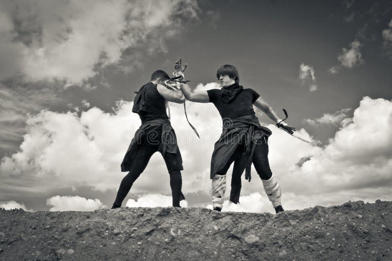 Two men are fighting stock photo. Image of action, beach - 81345070