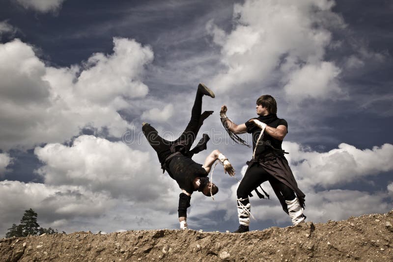 Two men are fighting stock photo. Image of martial, acrobat - 81344716