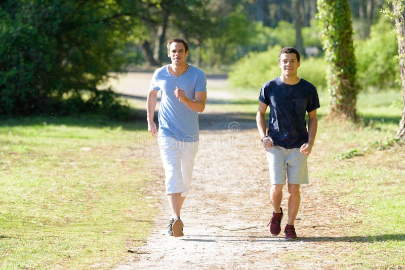 Two Men Friends Jogging Outdoors Stock Photo - Image of lifestyle ...