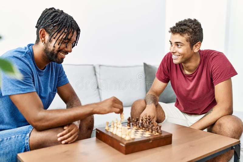 Two Men Friends Playing Chess Sitting on Sofa at Home Stock Image ...