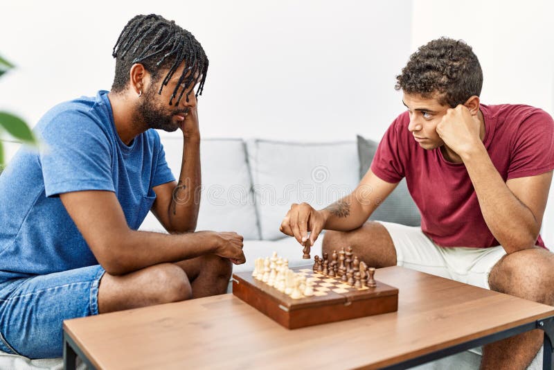 Two Men Friends Playing Chess Sitting on Sofa at Home Stock Image ...