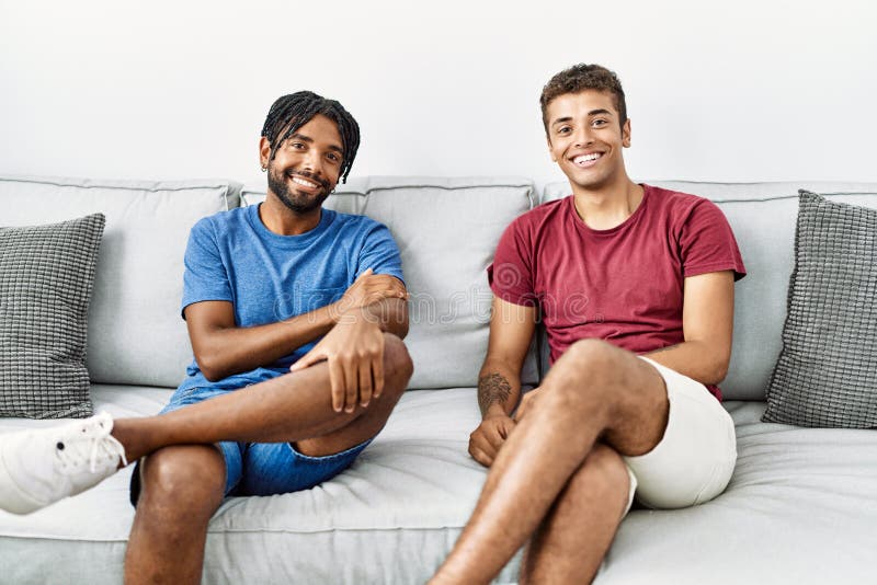 Two Men Friends Smiling Confident Sitting on Sofa at Home Stock Image ...