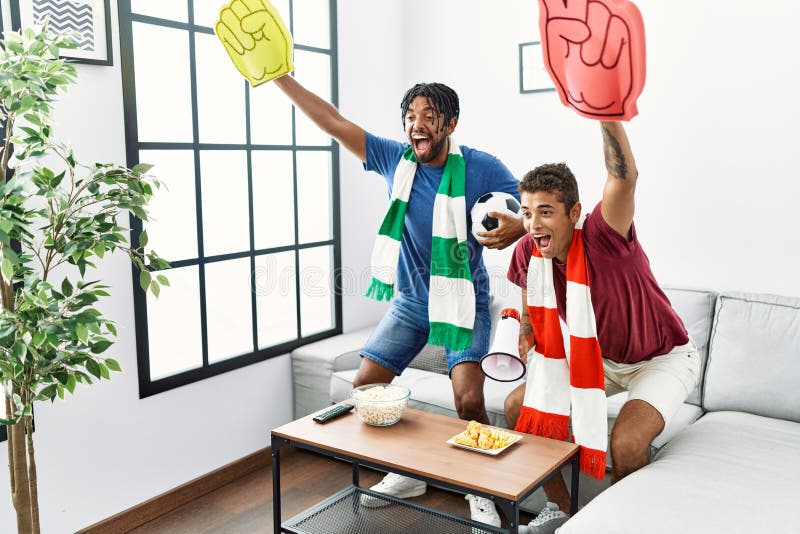 Two Men Friends Supporting Soccer Match Sitting on Sofa at Home Stock ...