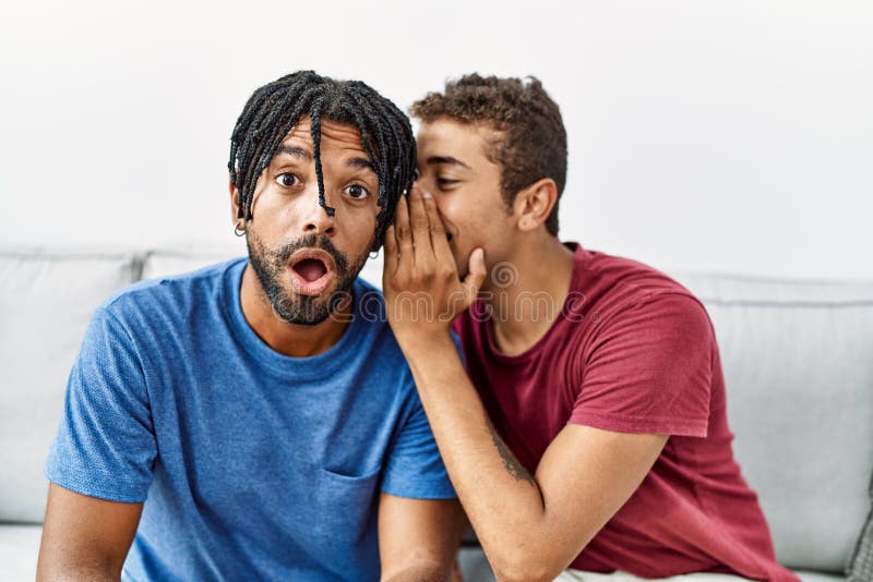 Two Men Friends Whispering Secret Sitting on Sofa at Home Stock Image ...