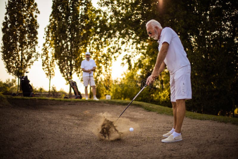 Two Men on the Golf Course. Stock Image - Image of ethnicity ...