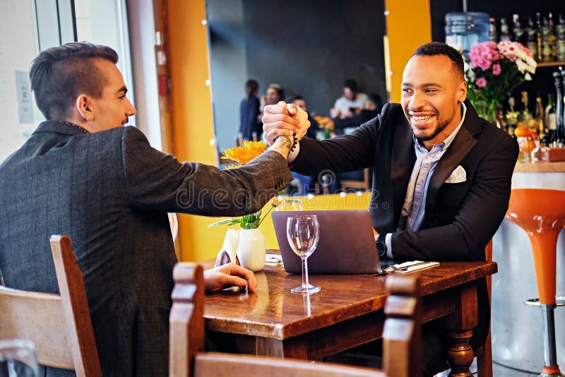 Two Men Handshake in a Restaurant. Stock Image - Image of caucasian ...