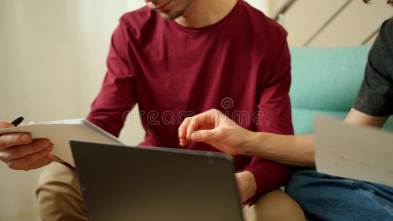 Two Men are Hard Working and Looking through Documents Stock Photo ...