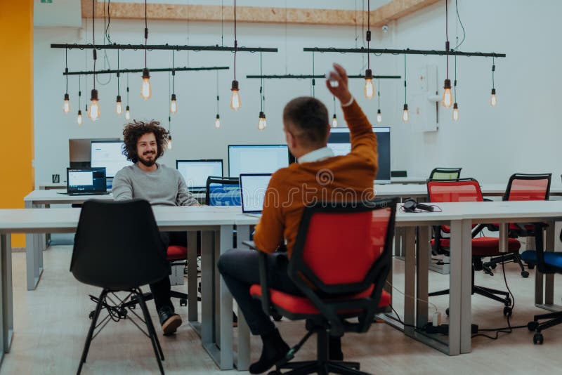 Two Men Having Fun on a Break from Work in a Modern Office Stock Image ...