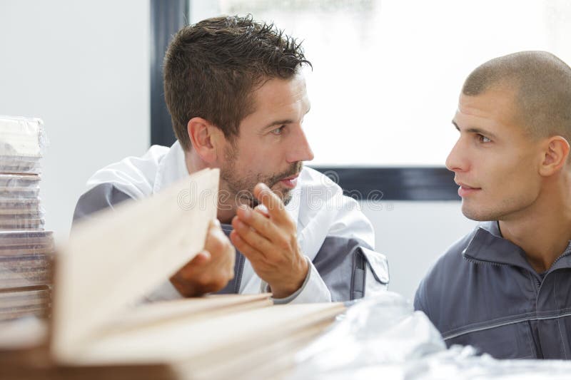 Two Men Holding Timber on Woodworking Machine Stock Image - Image of ...