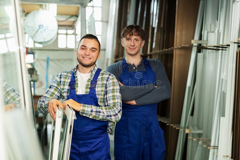 Two men inspecting windows stock image. Image of polymer - 56879065